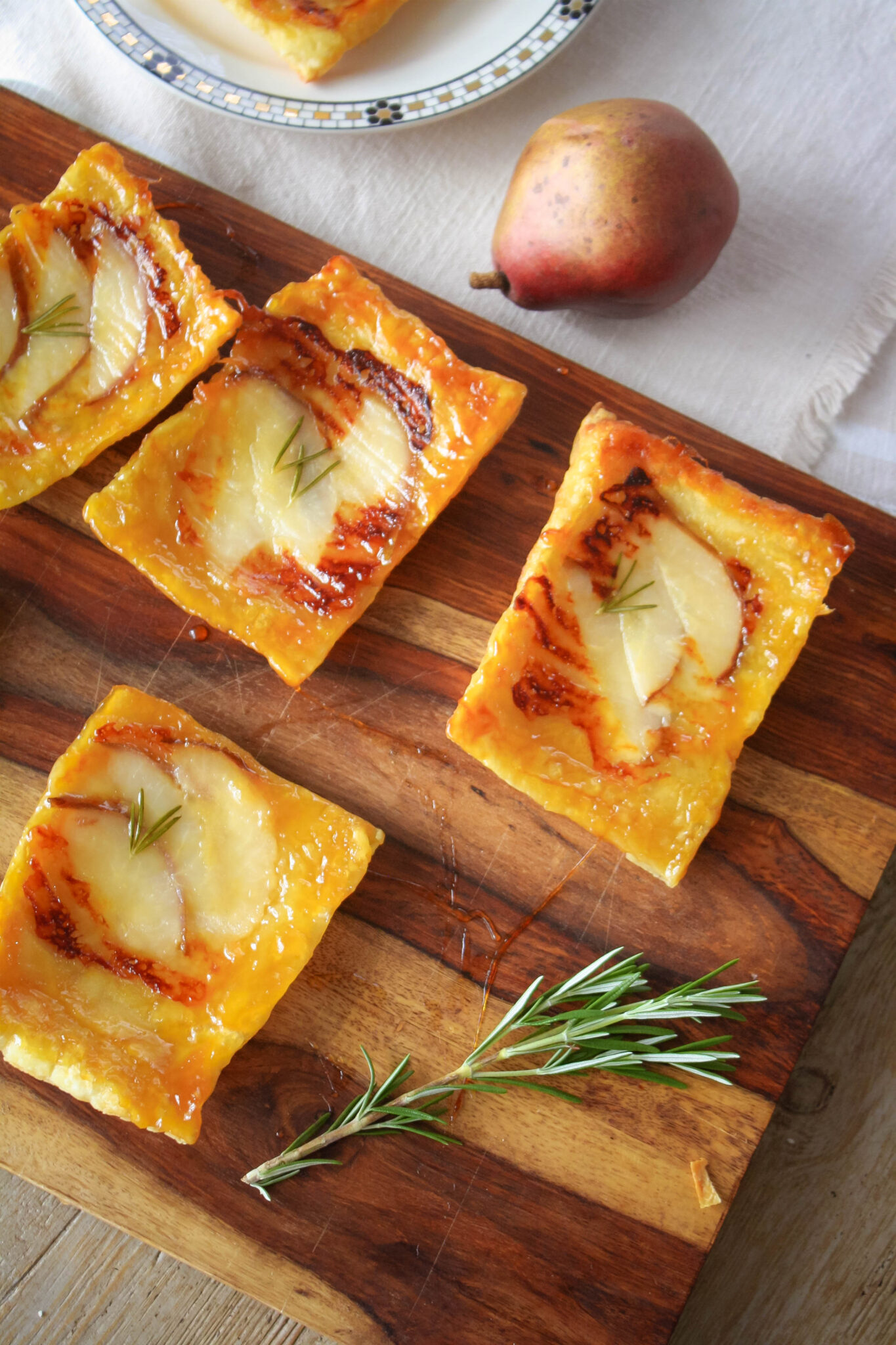 Upside-Down Pear Puff Pastry Tarts